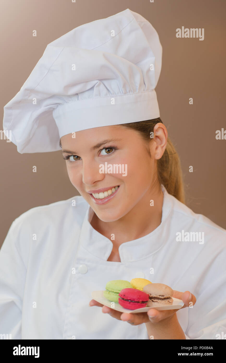 Female baker beautiful smile holding hi-res stock photography and ...