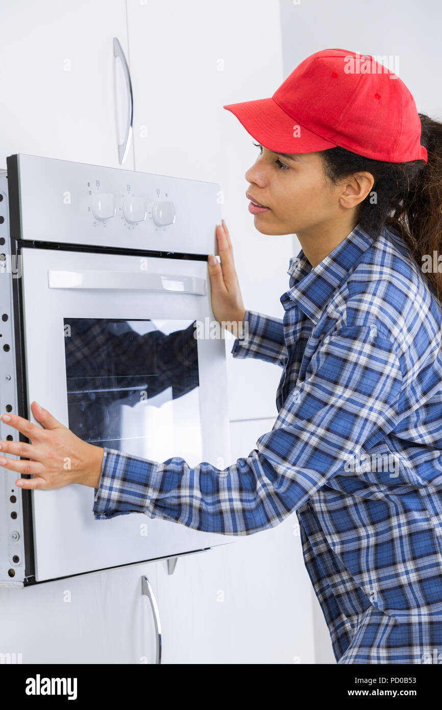 fitting an oven Stock Photo - Alamy