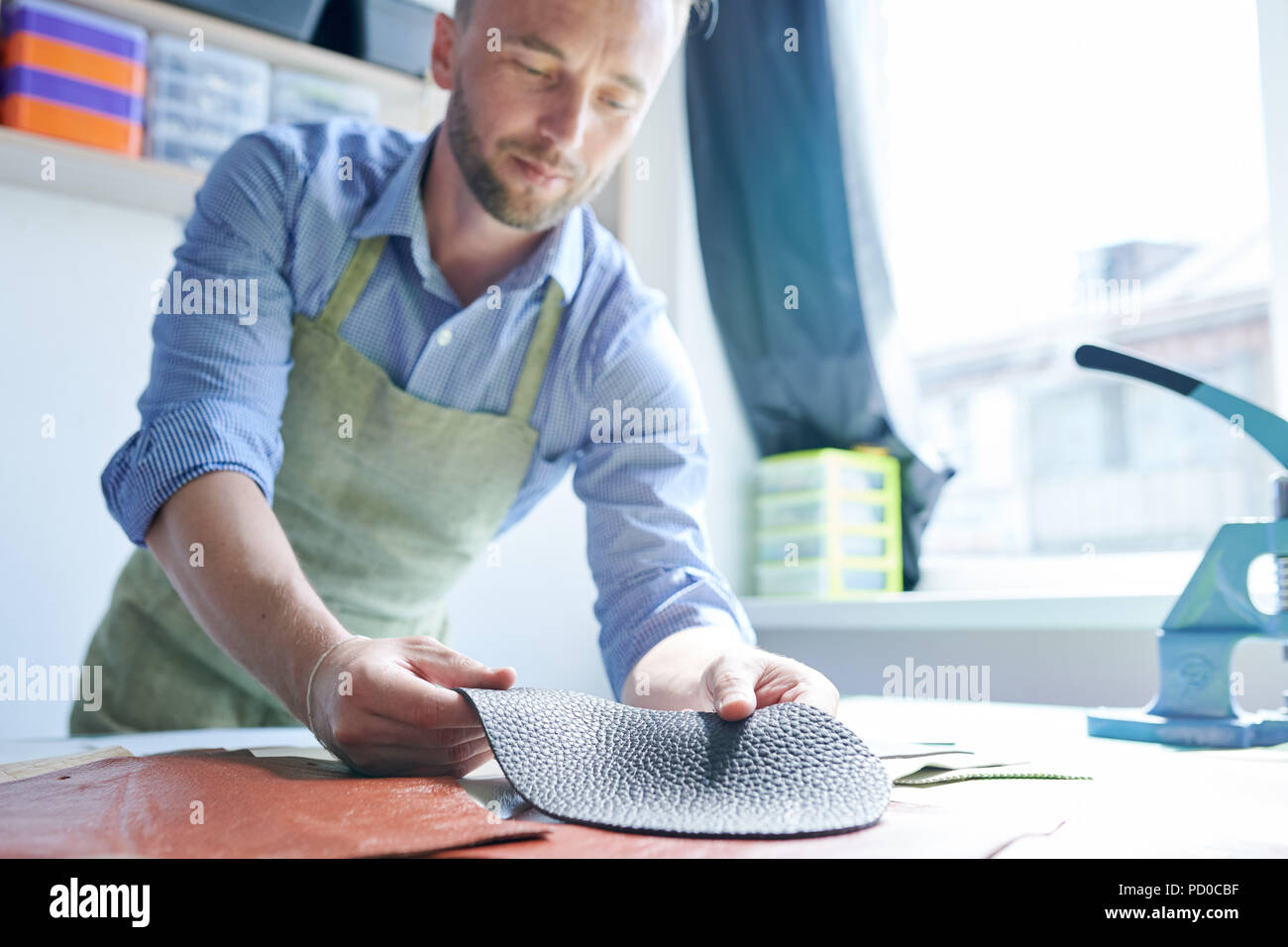 Professional tanner at work Stock Photo - Alamy