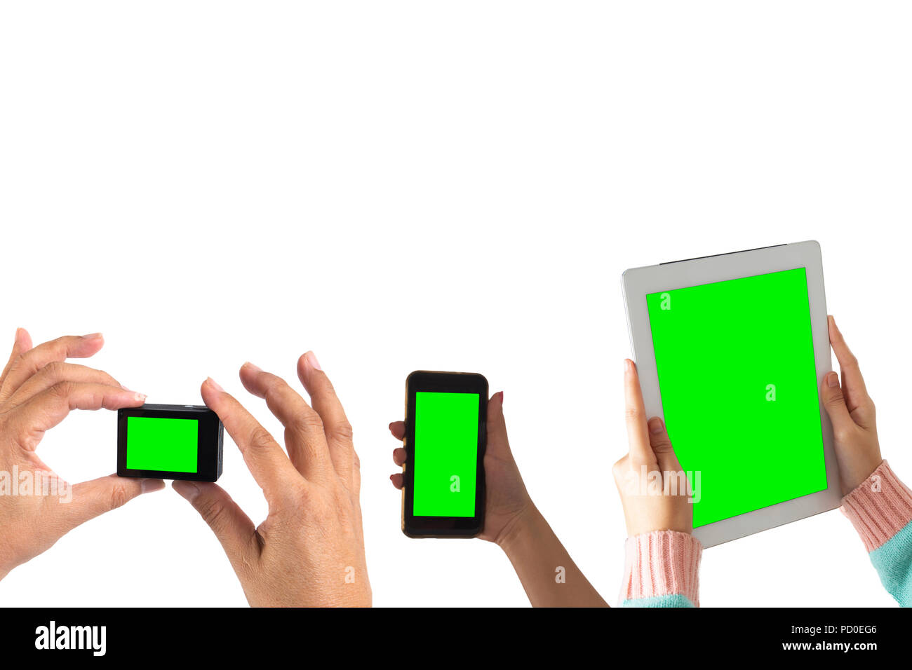 Many people lift hands up to take photo by smart device that show green ...