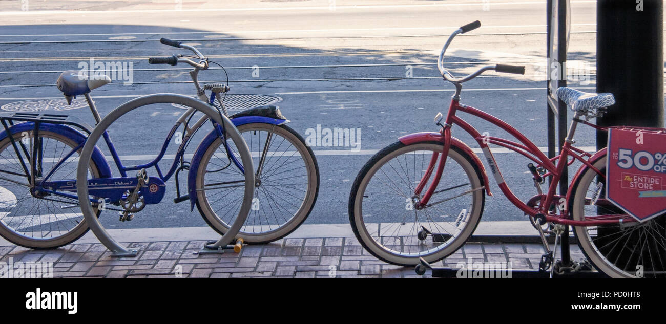 Leaving a downtown San Francisco mall these tethered bikes were along ...