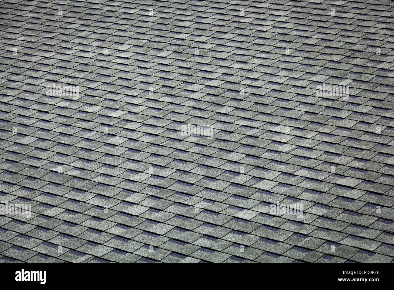A gray geometric texture with the same rectangles. Close-up of a roof ...