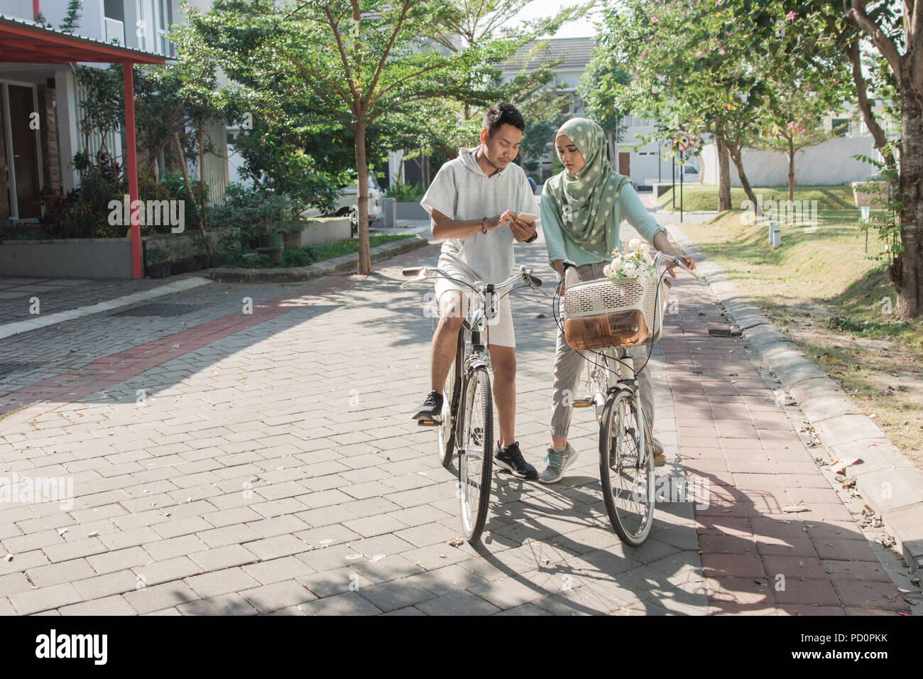 having fun riding a bike Stock Photo - Alamy