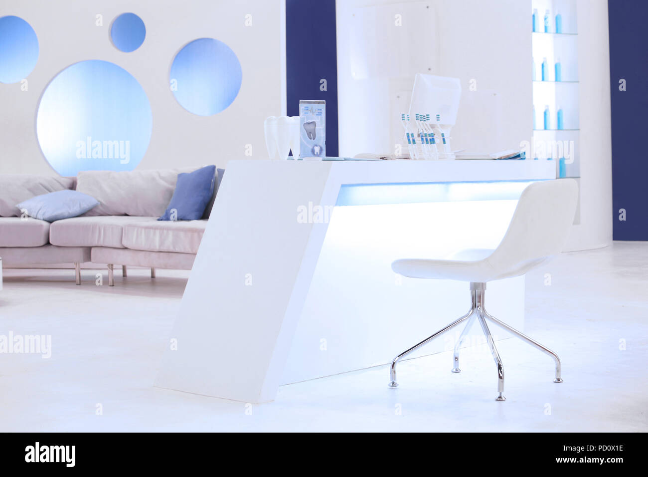 a white dental counter was setup in studio on blue background Stock ...