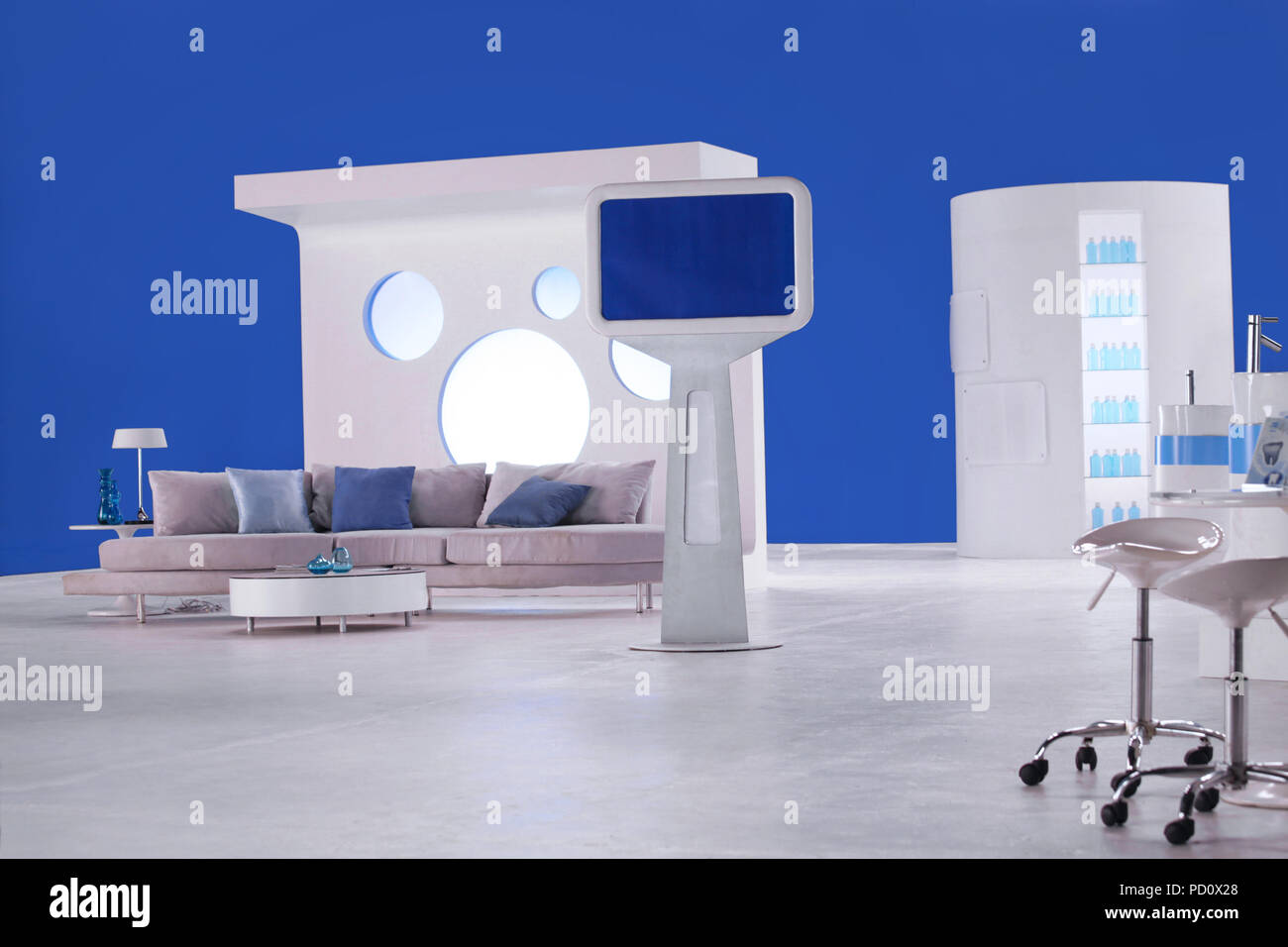 setup of waiting area and blank monitor on blue background for shooting ...