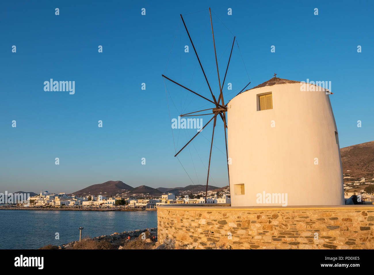 Traditional cycladic windmill at sunset on Paros island, Cyclades ...