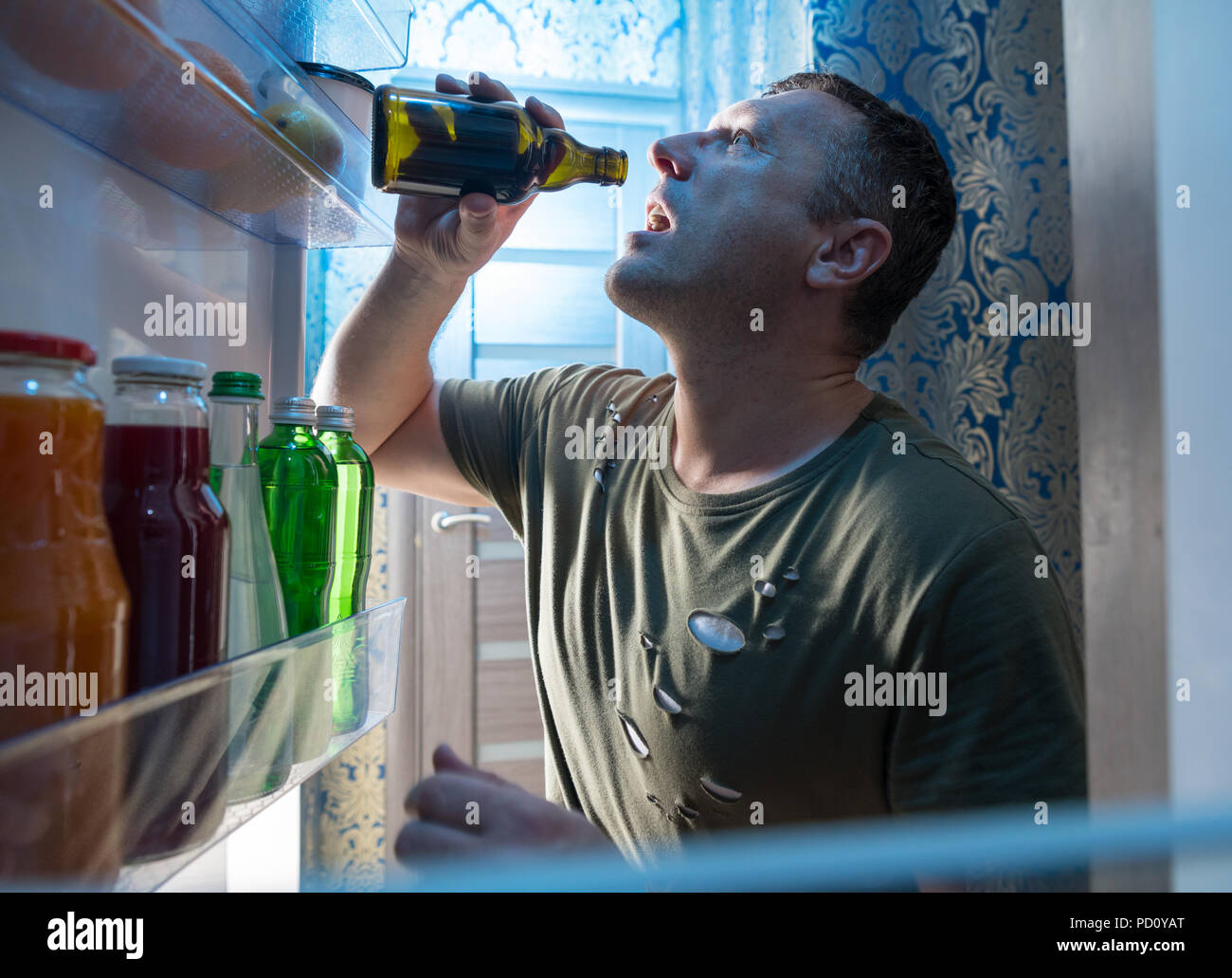 Grabbing food from fridge hi-res stock photography and images - Alamy