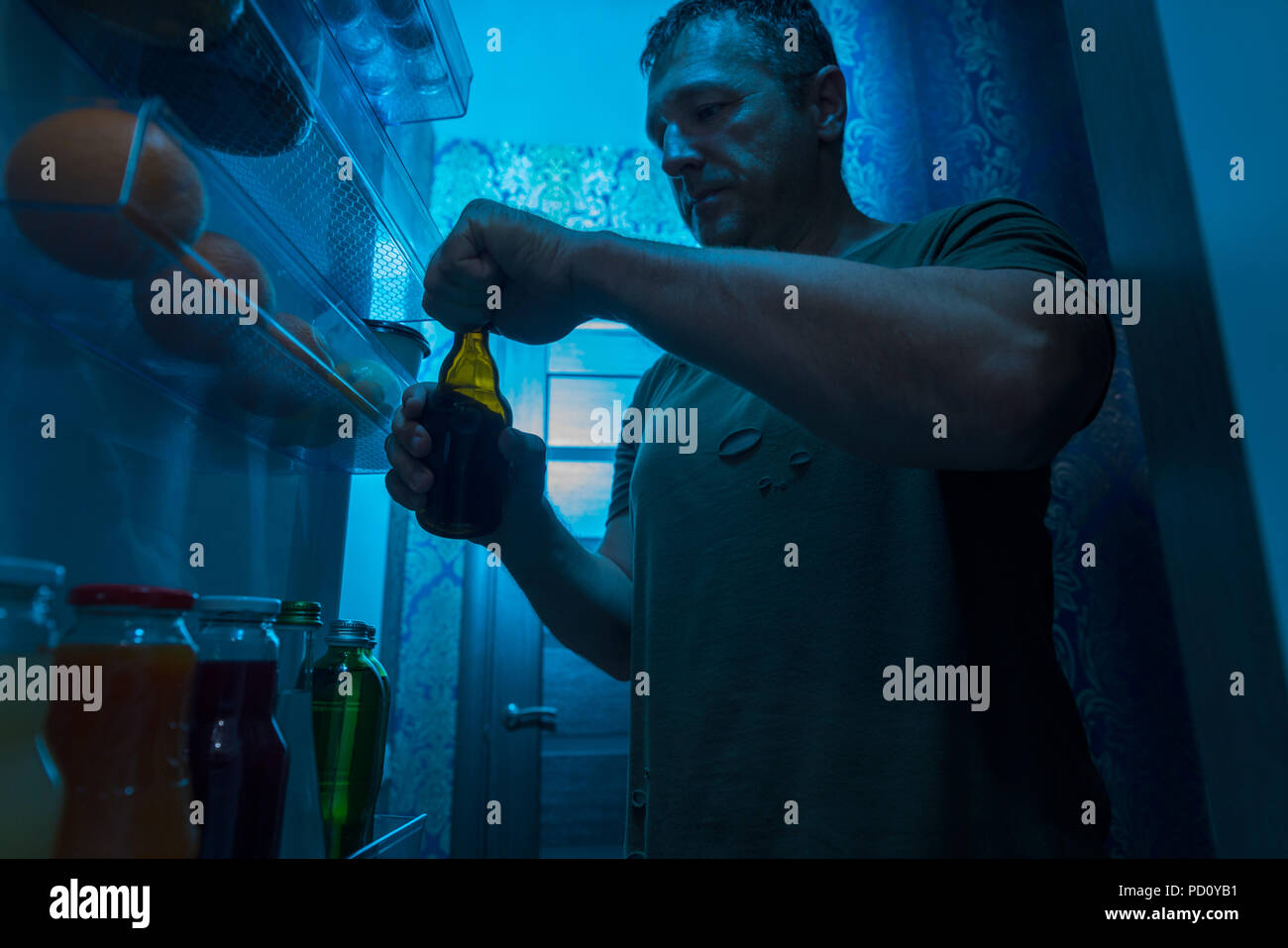 Grabbing food from fridge hi-res stock photography and images - Alamy