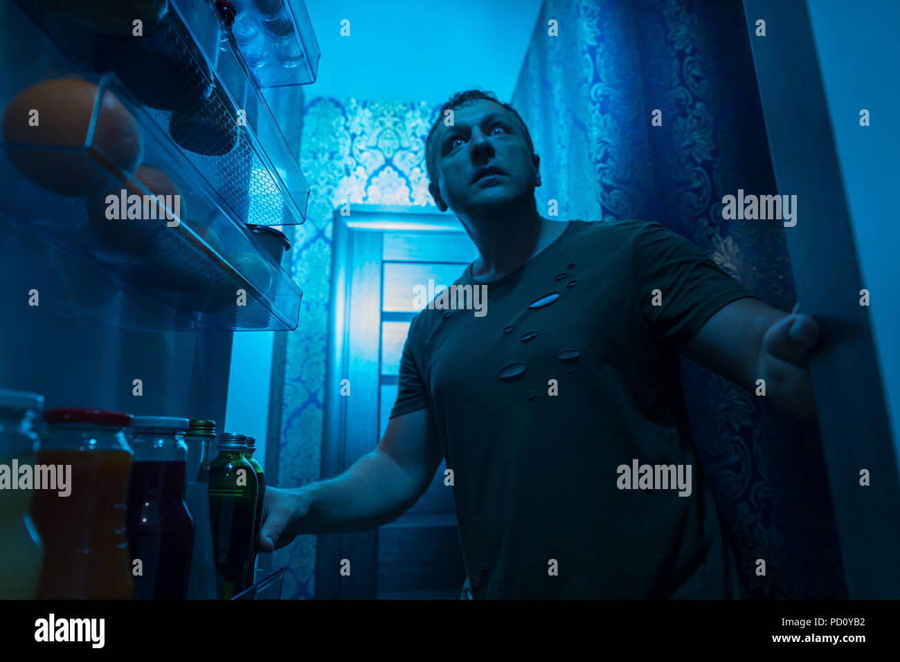 Grabbing food from fridge hi-res stock photography and images - Alamy