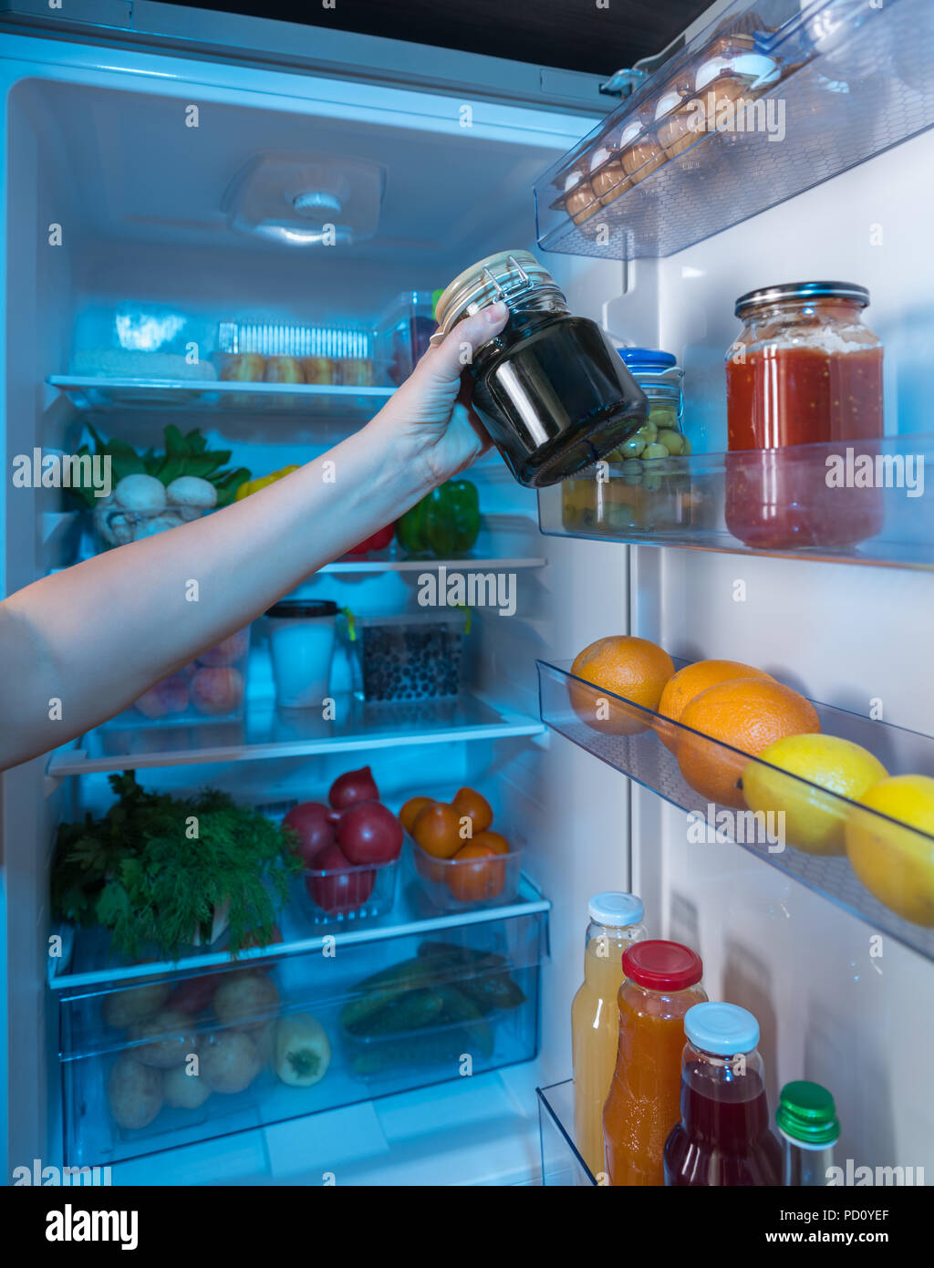 Person reaching shelf storage hi-res stock photography and images - Alamy