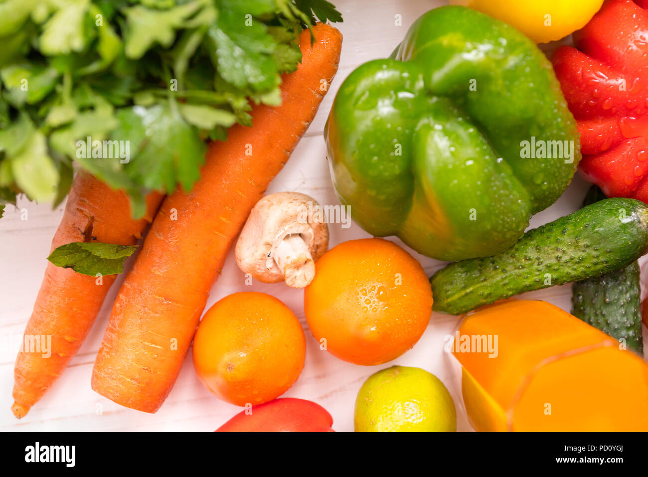 Healthy clean washed fresh vegetables with droplets of water including ...