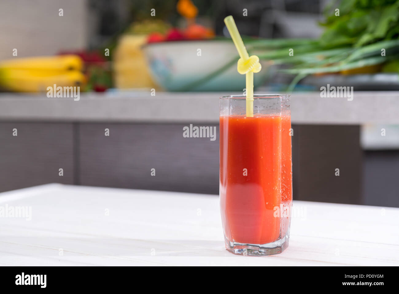 Glass of fresh vegetable juice full of vitamins with straw Stock Photo ...