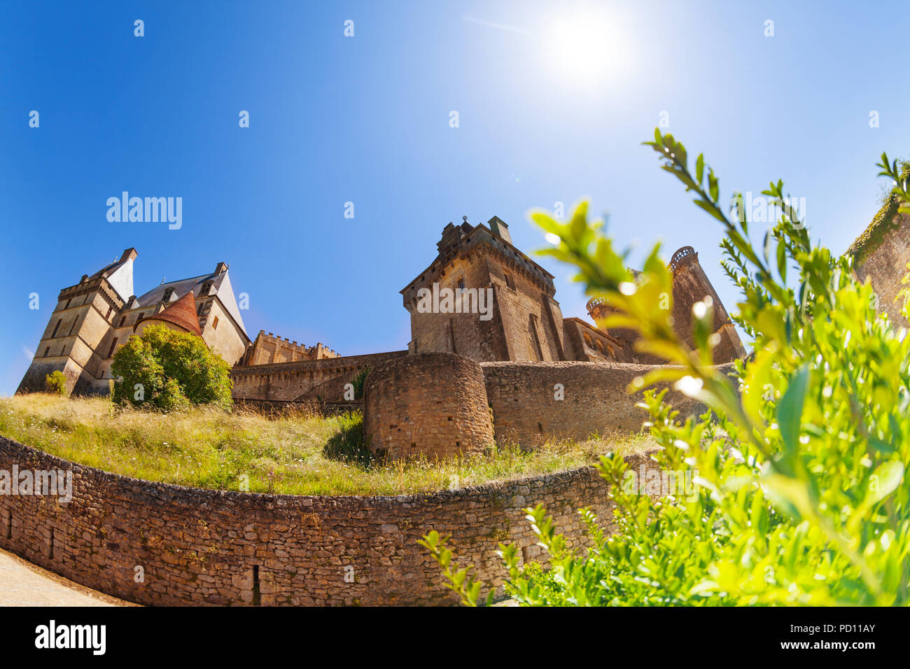 Fish-eye picture of Chateau de Biron castle Stock Photo - Alamy