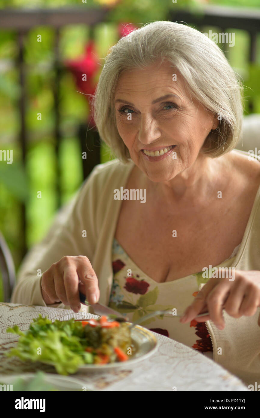 Cheerful eating hi-res stock photography and images - Alamy
