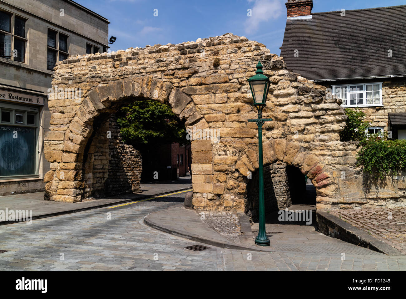 Lincoln, United Kingdom - 07/21/2018: Newport Arch in Lincoln in the UK ...