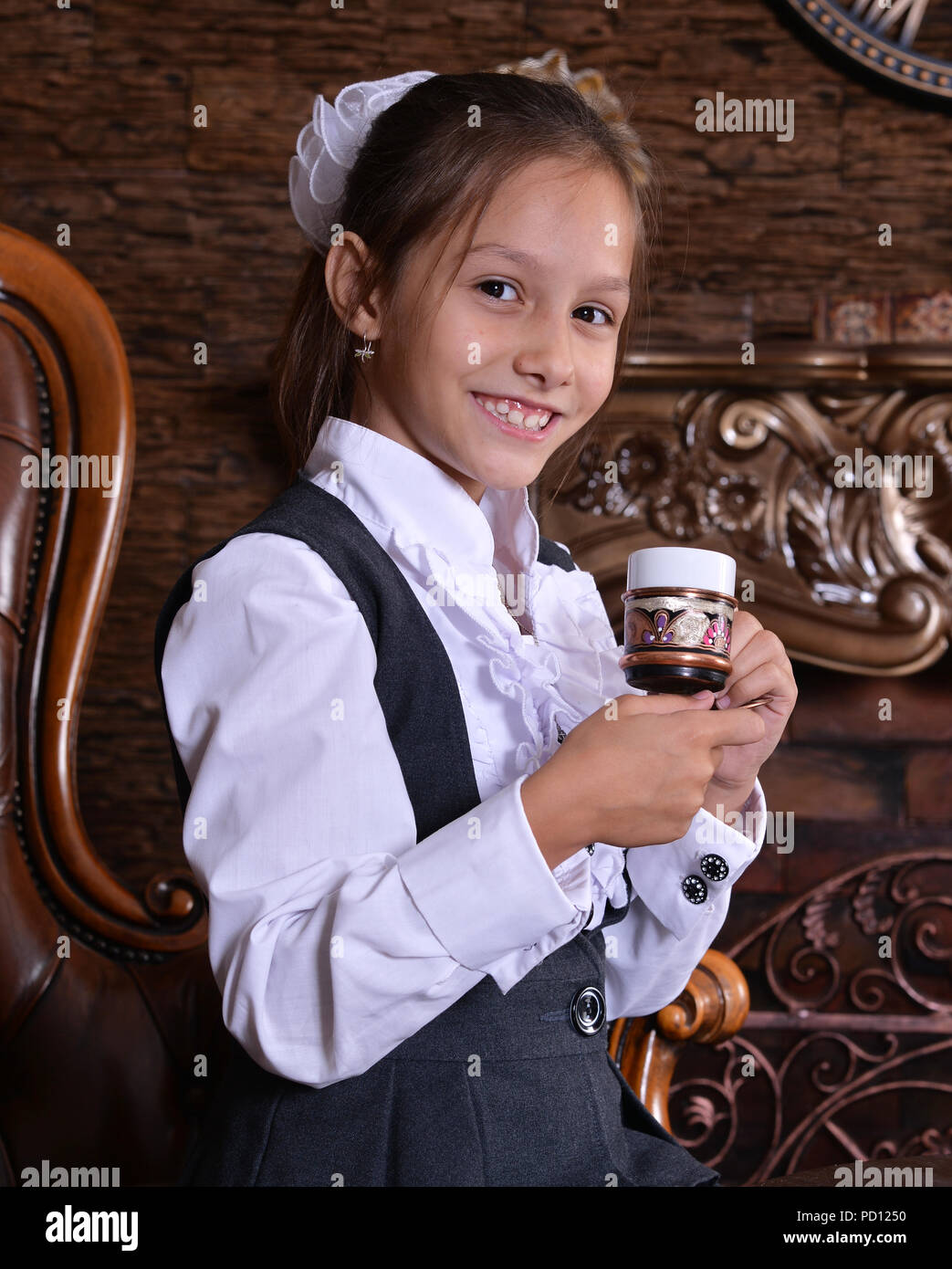 Girl drinking tea Stock Photo - Alamy