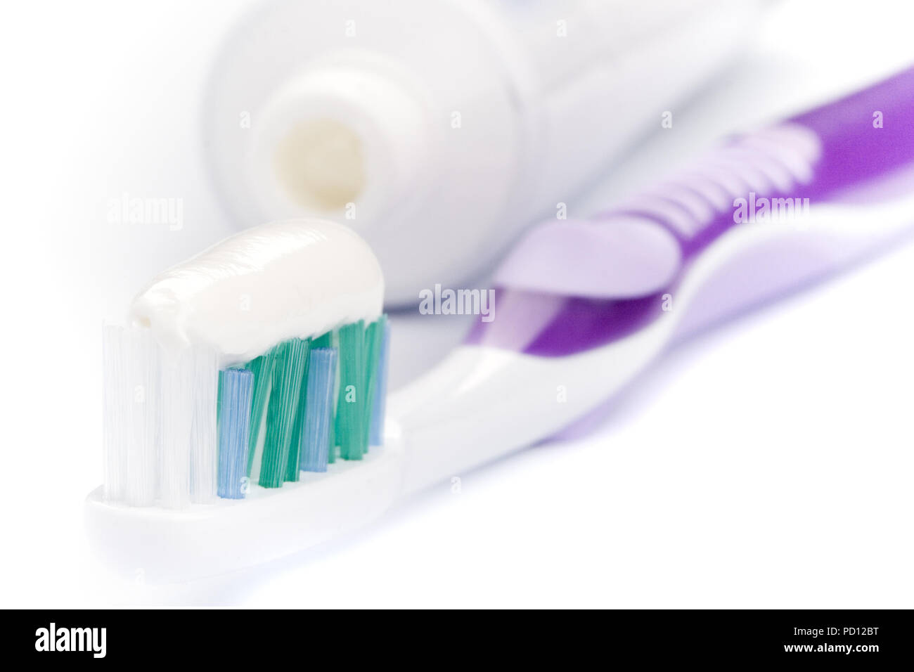 toothpaste and toothbrush on white. dental care Stock Photo - Alamy