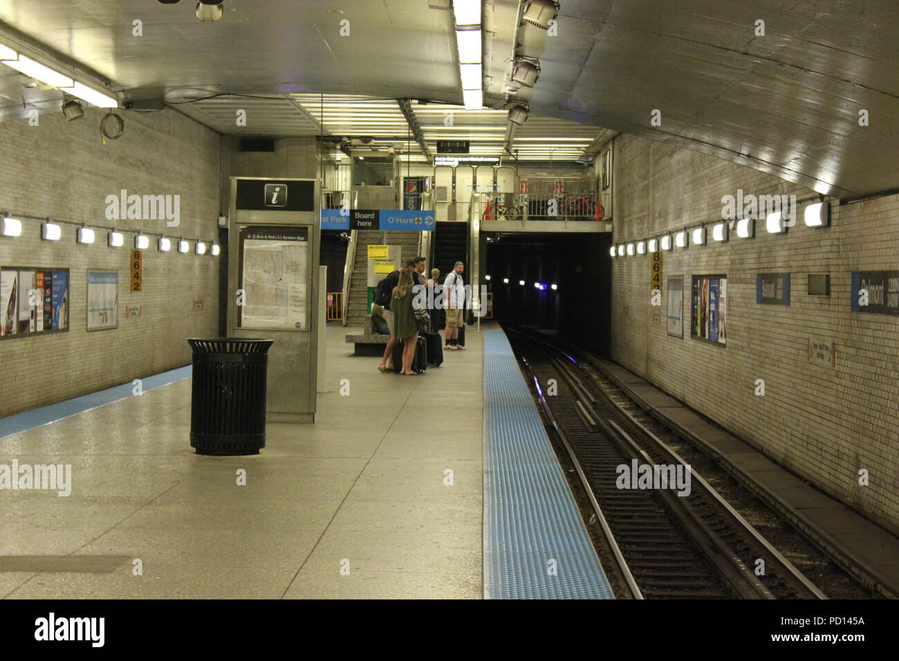 CTA Blue Line subterranean train station at Belmont Avenue in Chicago ...