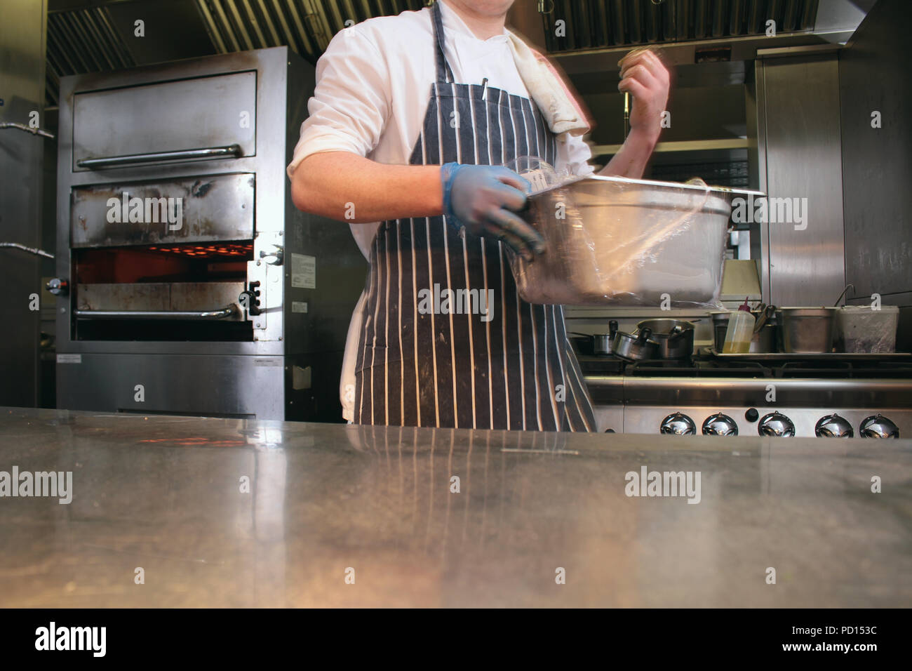 Chef in action preparing steak hi-res stock photography and images - Alamy