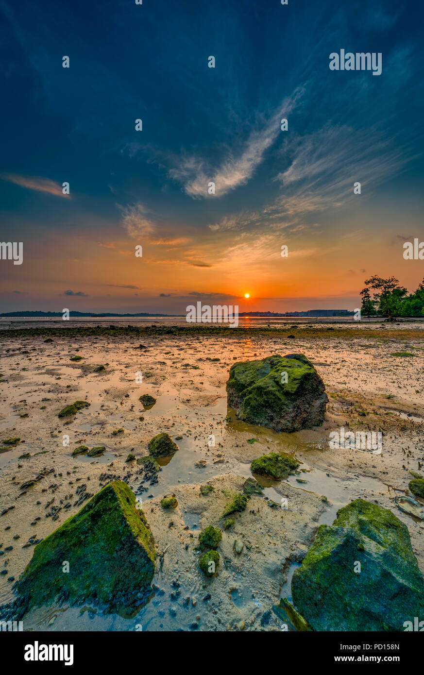 Sunrise at Pasir Ris Beach in Singapore Stock Photo - Alamy