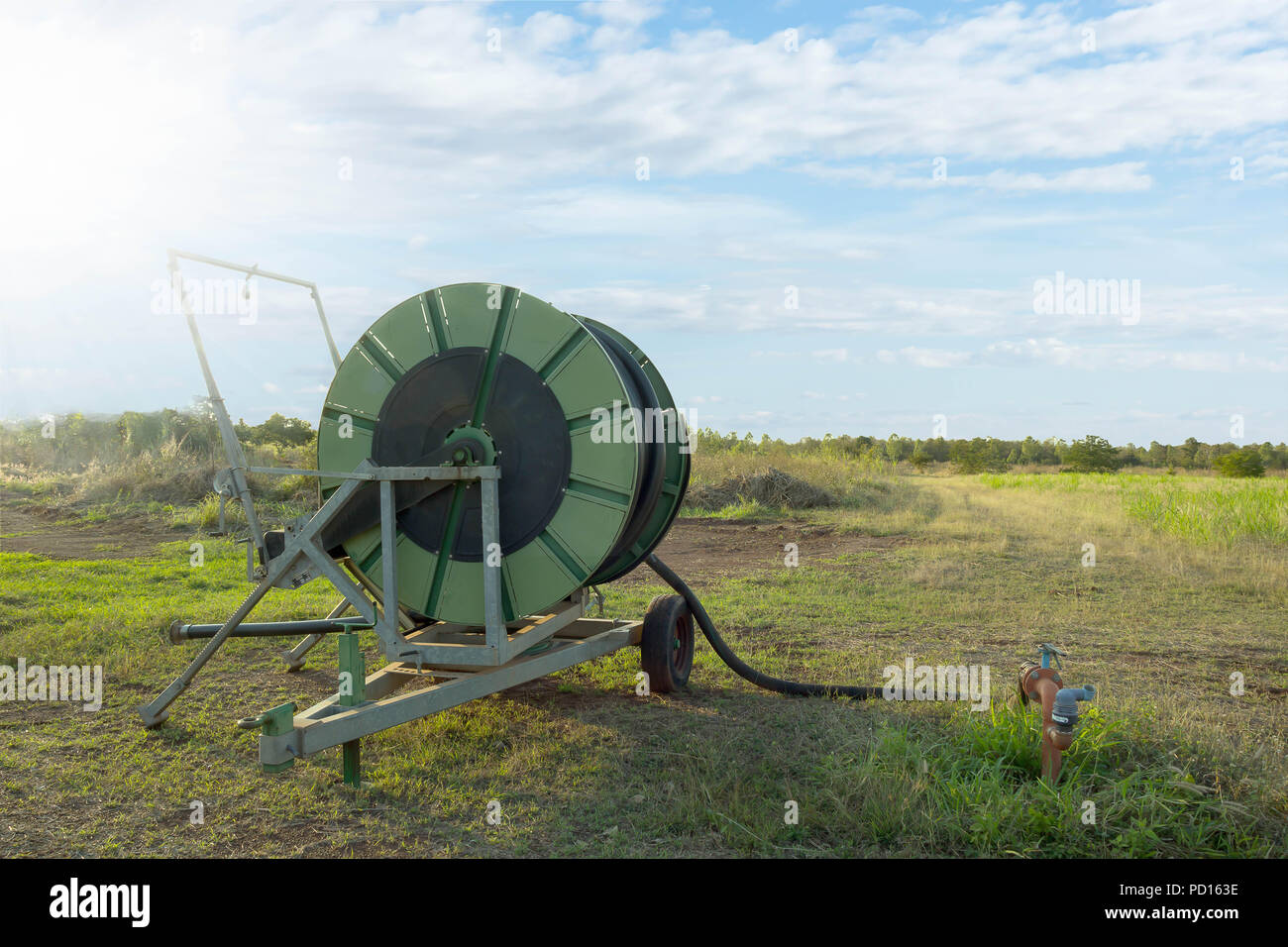 Agricultural water pipeline at farm with blue sky Stock Photo - Alamy