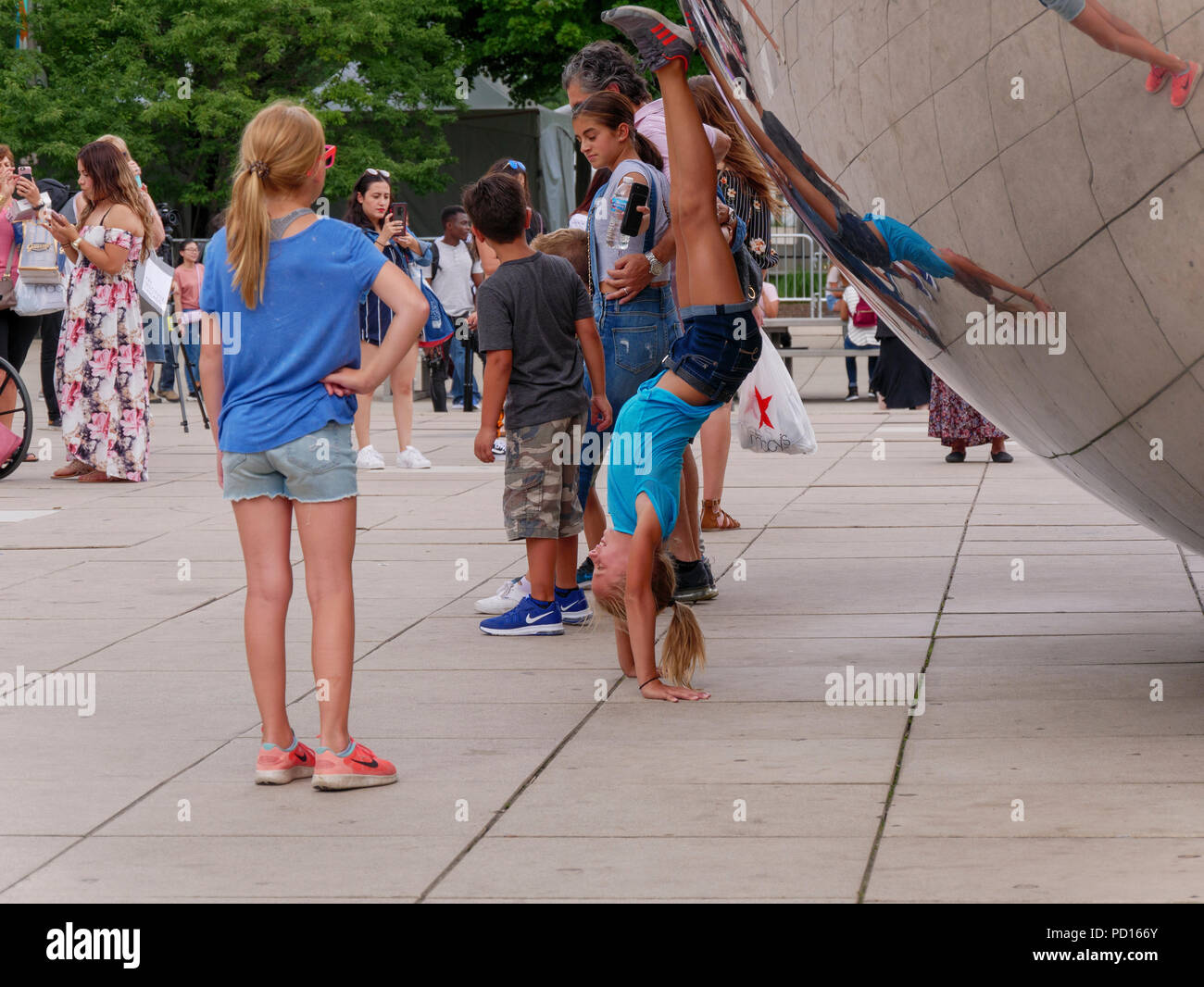 Girl doing handstand hi-res stock photography and images - Alamy