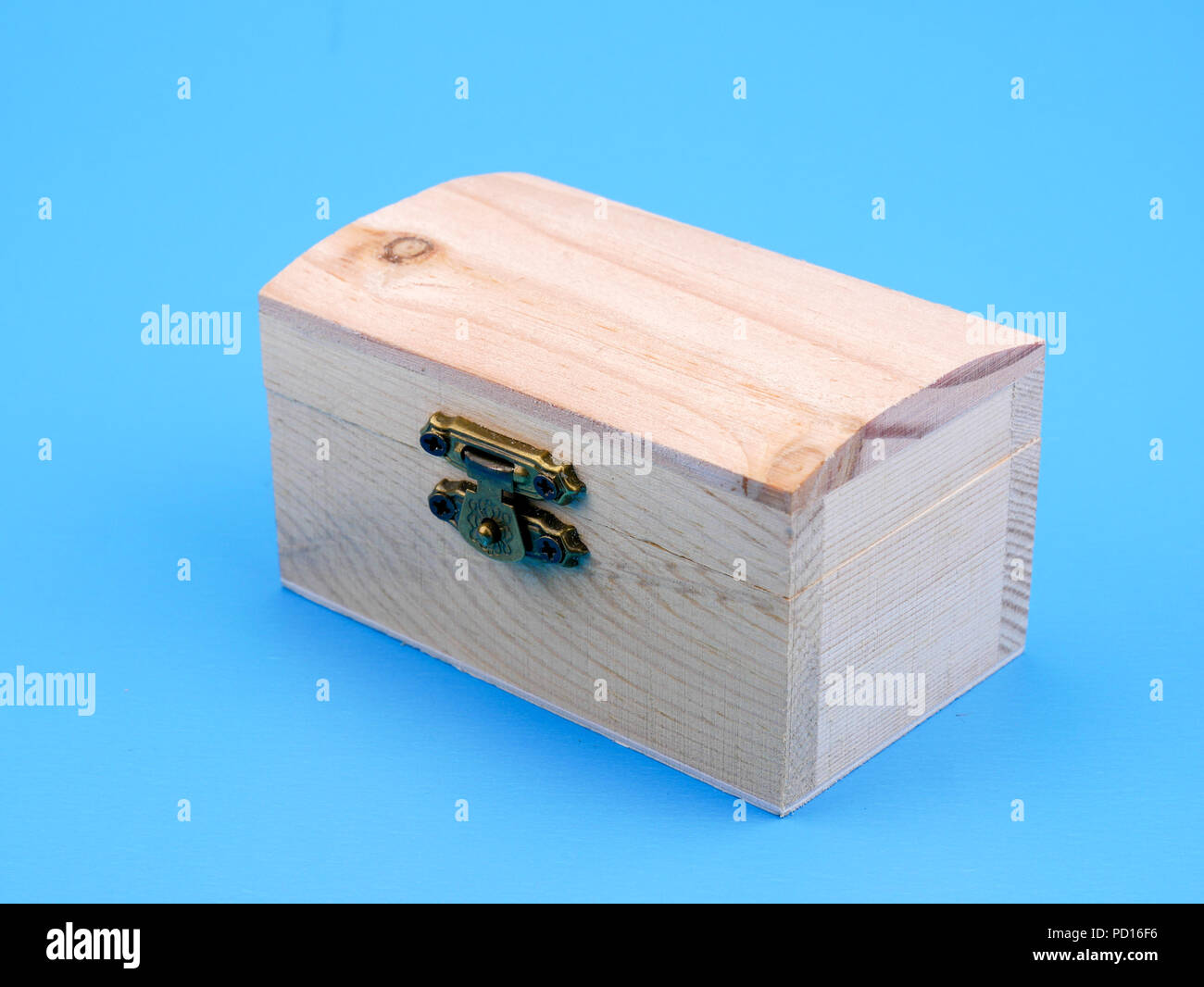 Empty wooden square box on blue background Stock Photo - Alamy