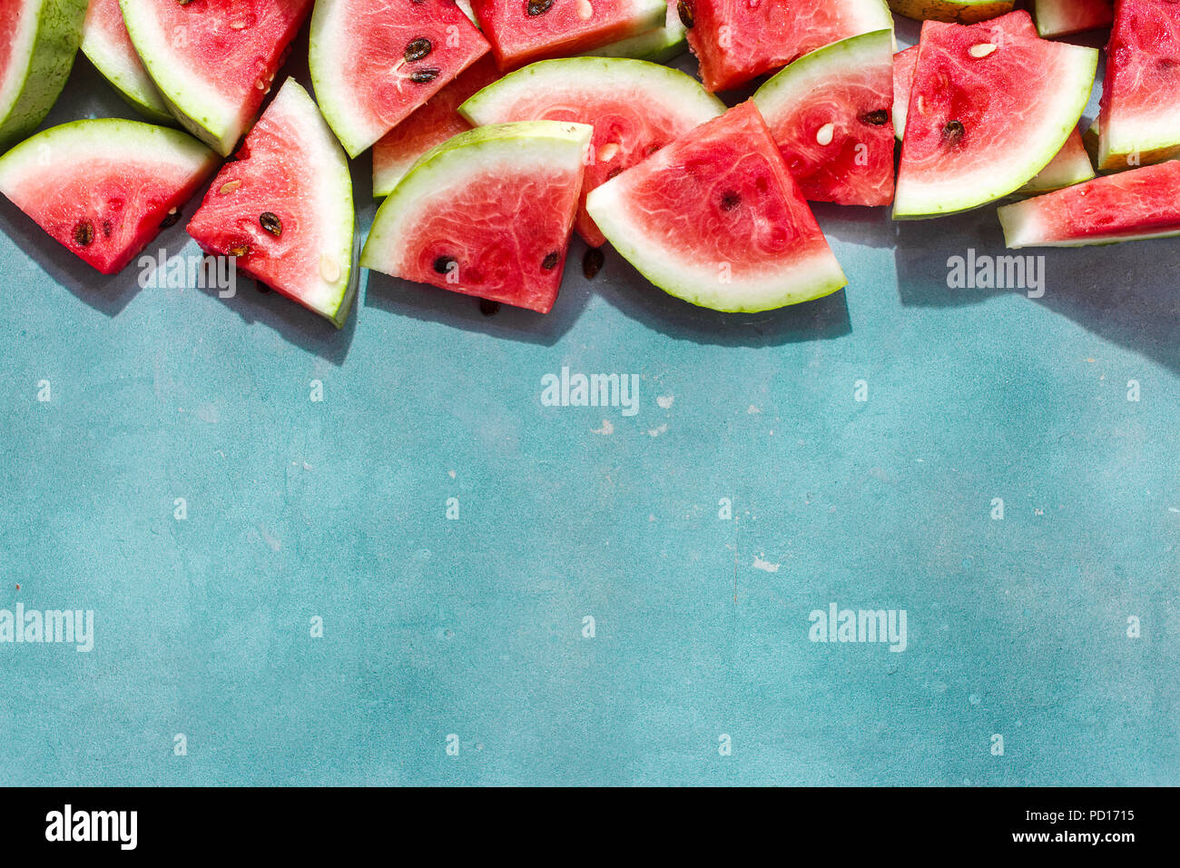 Flat lay Watermelon slice on stone blue background with copy space top ...