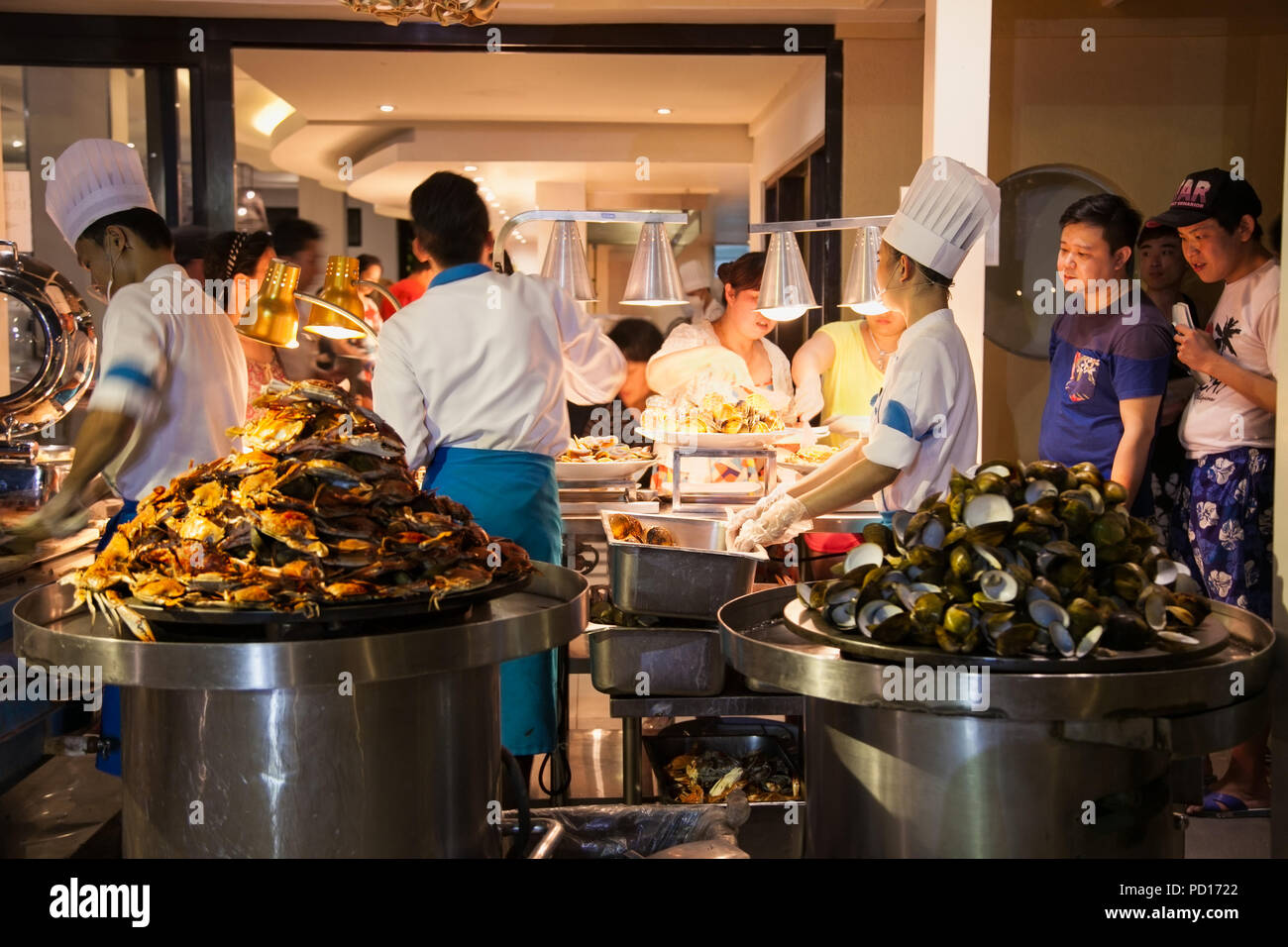 BORACAY, PHILIPHINES-MARCH 17, 2016:Group of chef preparing food in the ...