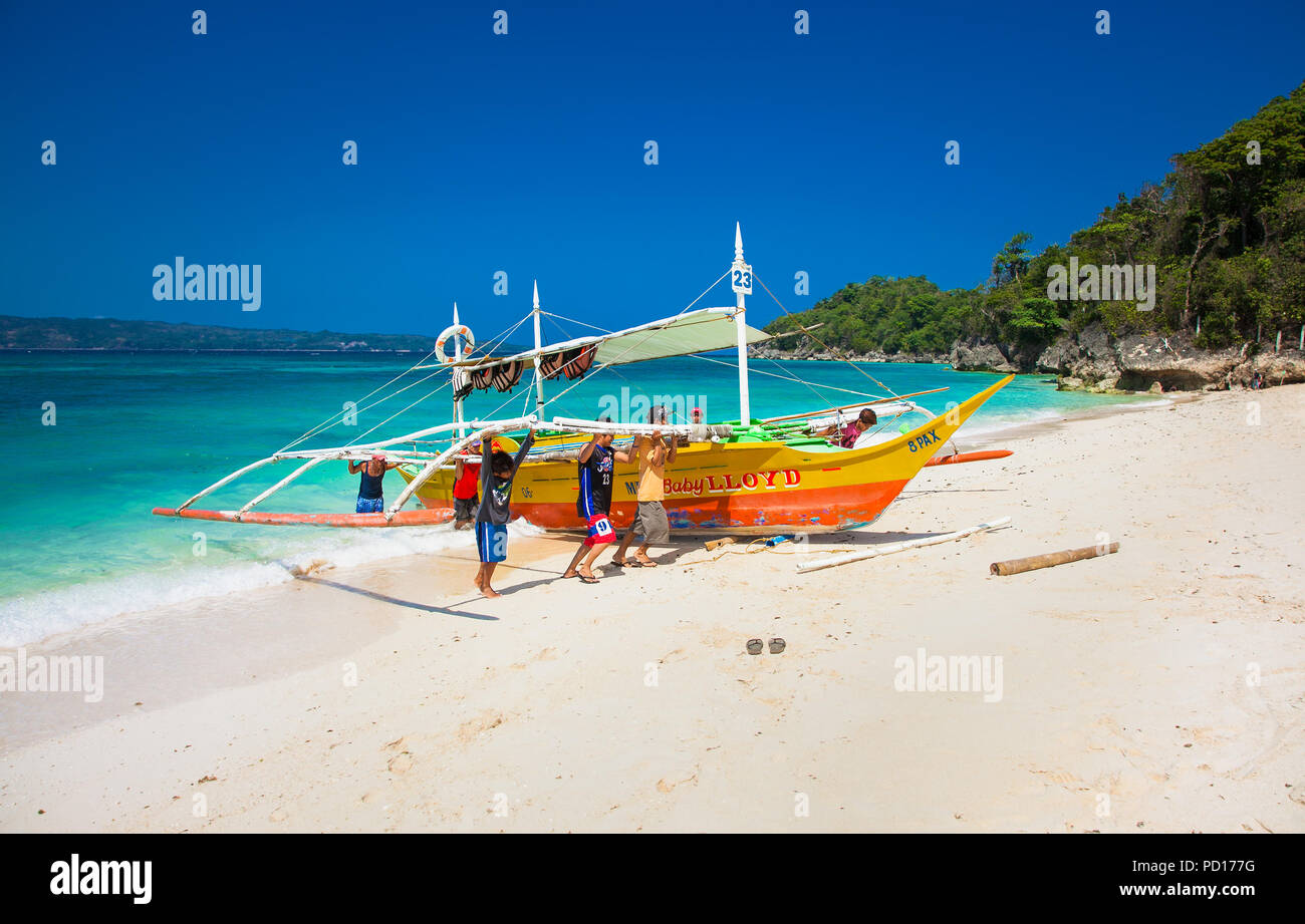 BORACAY, PHILIPPINES-MARCH 21, 2016: Local fishermen take the ...