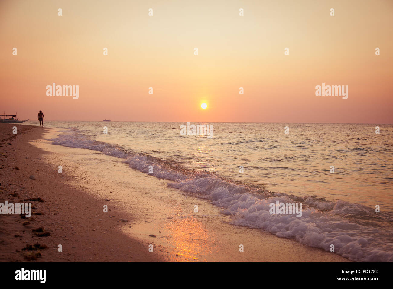 Tropical background sunset view at Puka beach, Boracay island ...