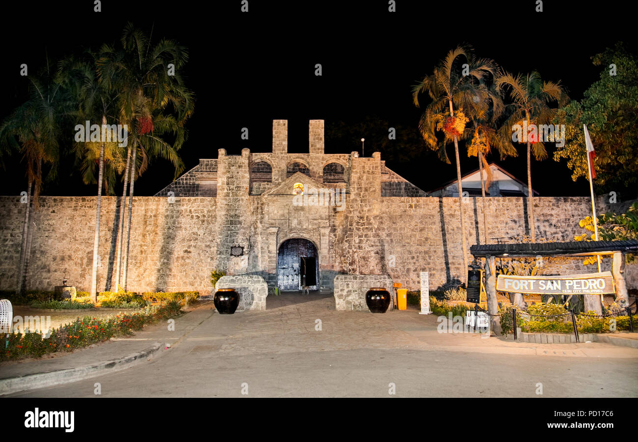 Entrance in Stone Fort San Pedro by night in Cebu city, Philippines ...