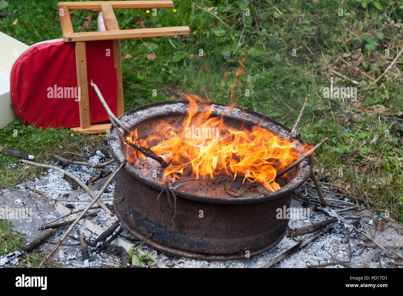 Bonfire and a broken children chair about setting to fire Stock Photo ...