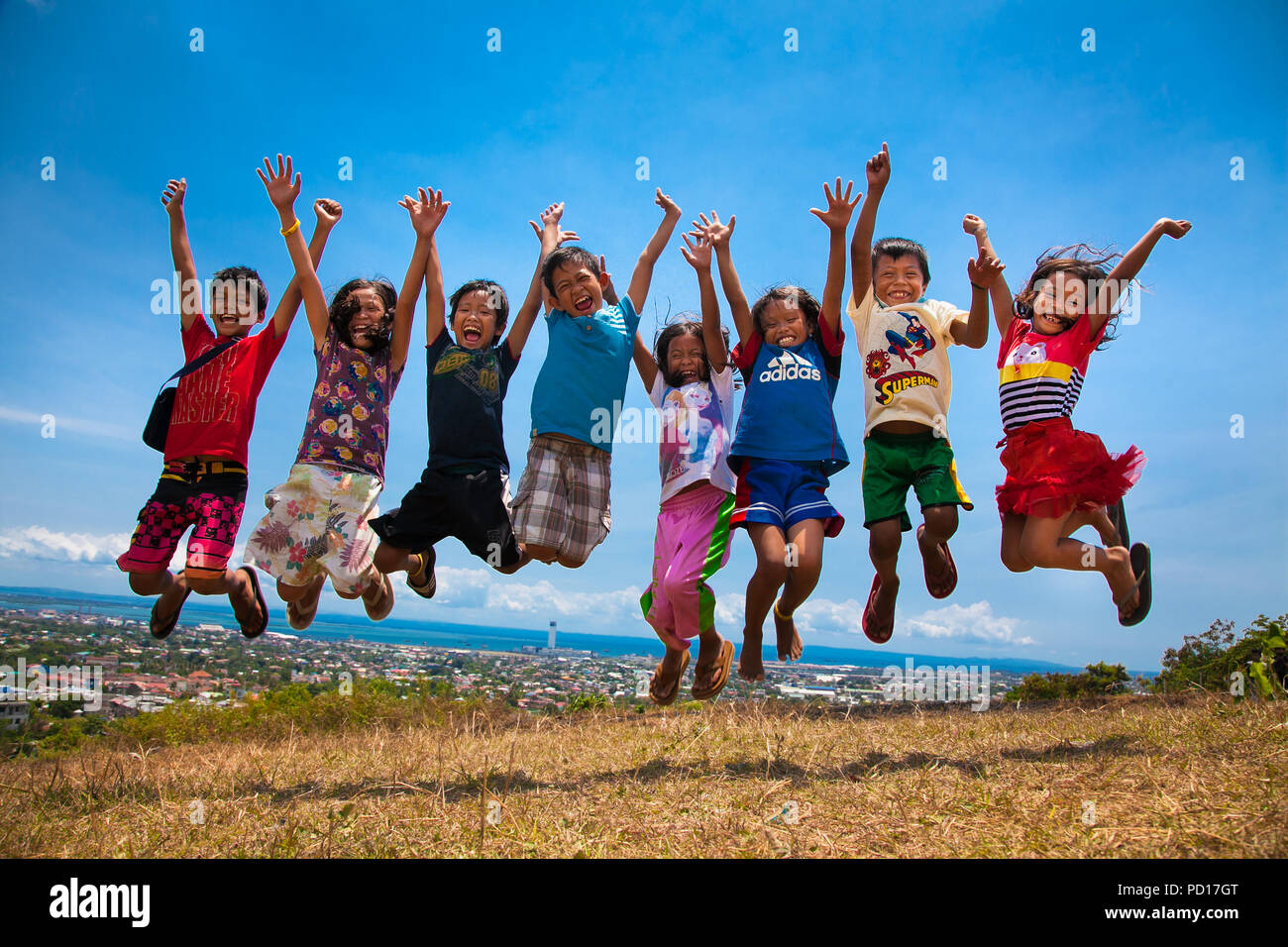 Philippines children jumping hi-res stock photography and images - Alamy