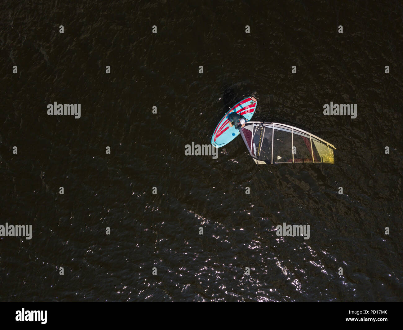 Aerial view of a windsurfer floating on a river Stock Photo - Alamy