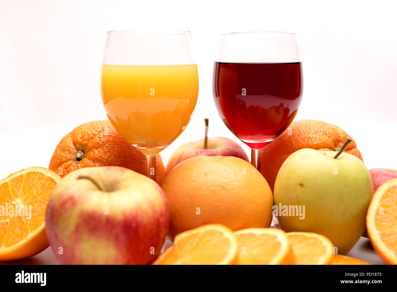 sweet juice and fruits on white background Stock Photo - Alamy