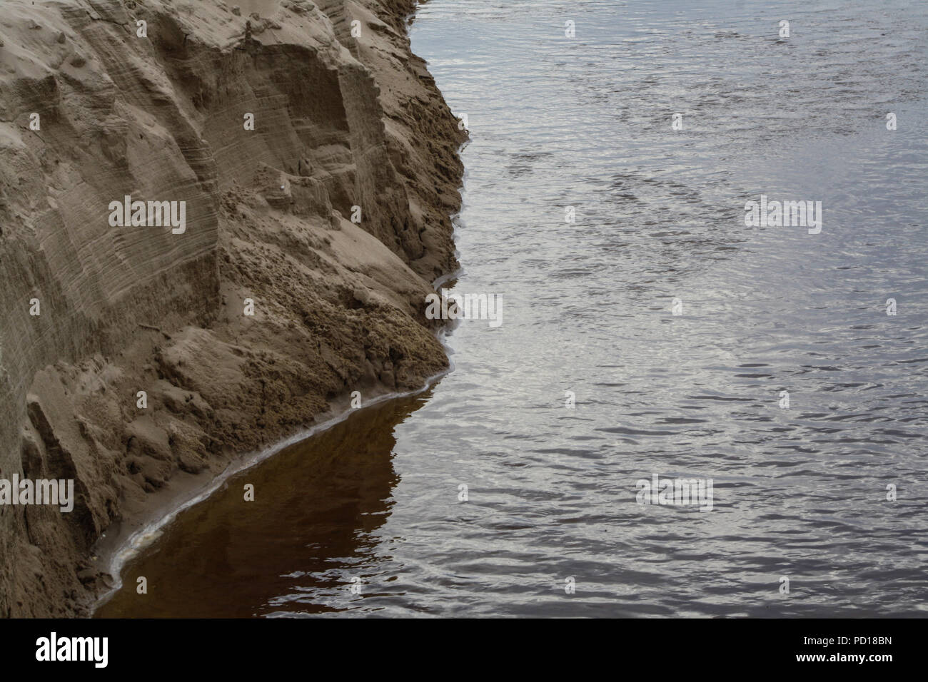 picture split in a half, sand and water Stock Photo - Alamy