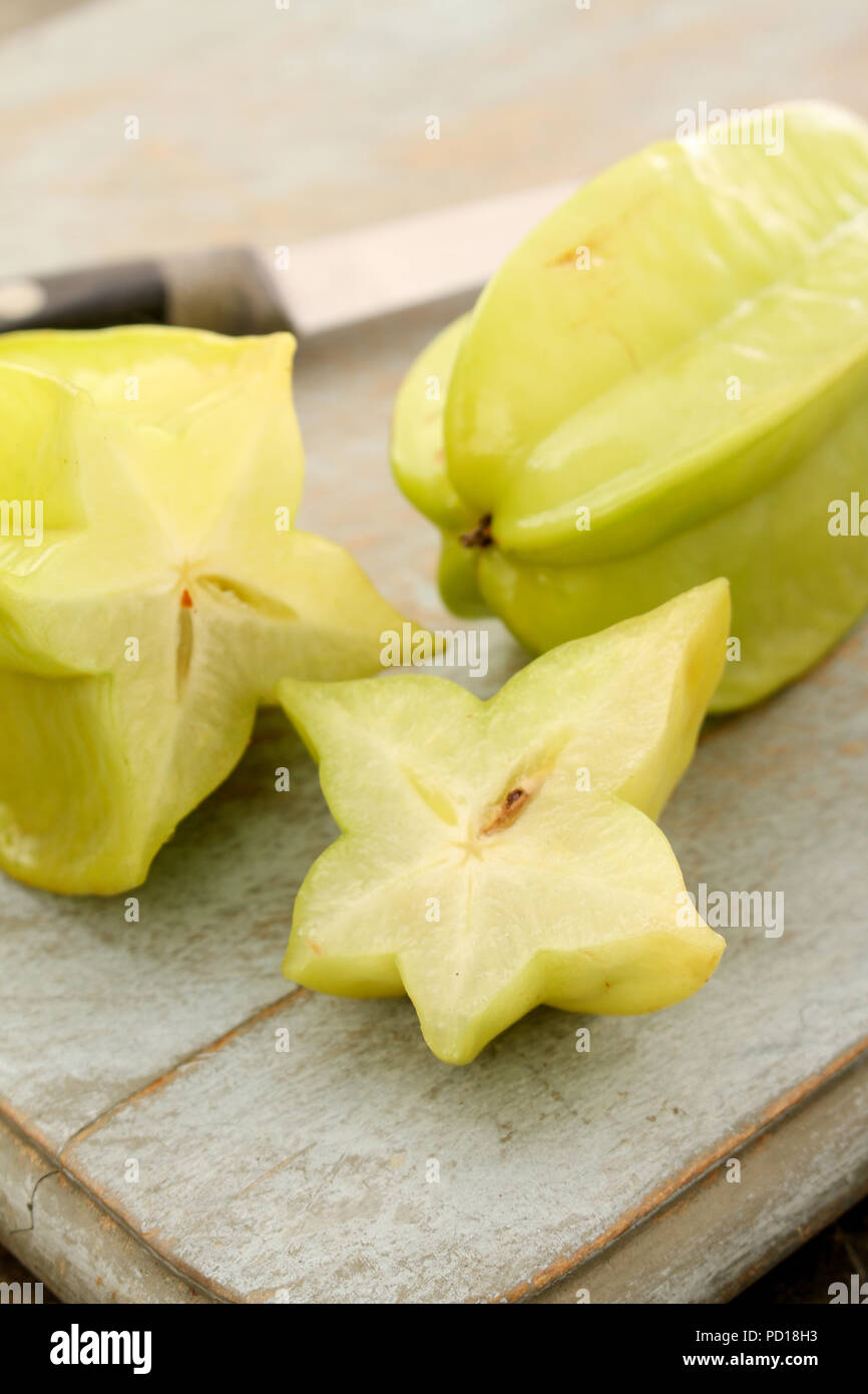 preparing fresh starfruit Stock Photo - Alamy