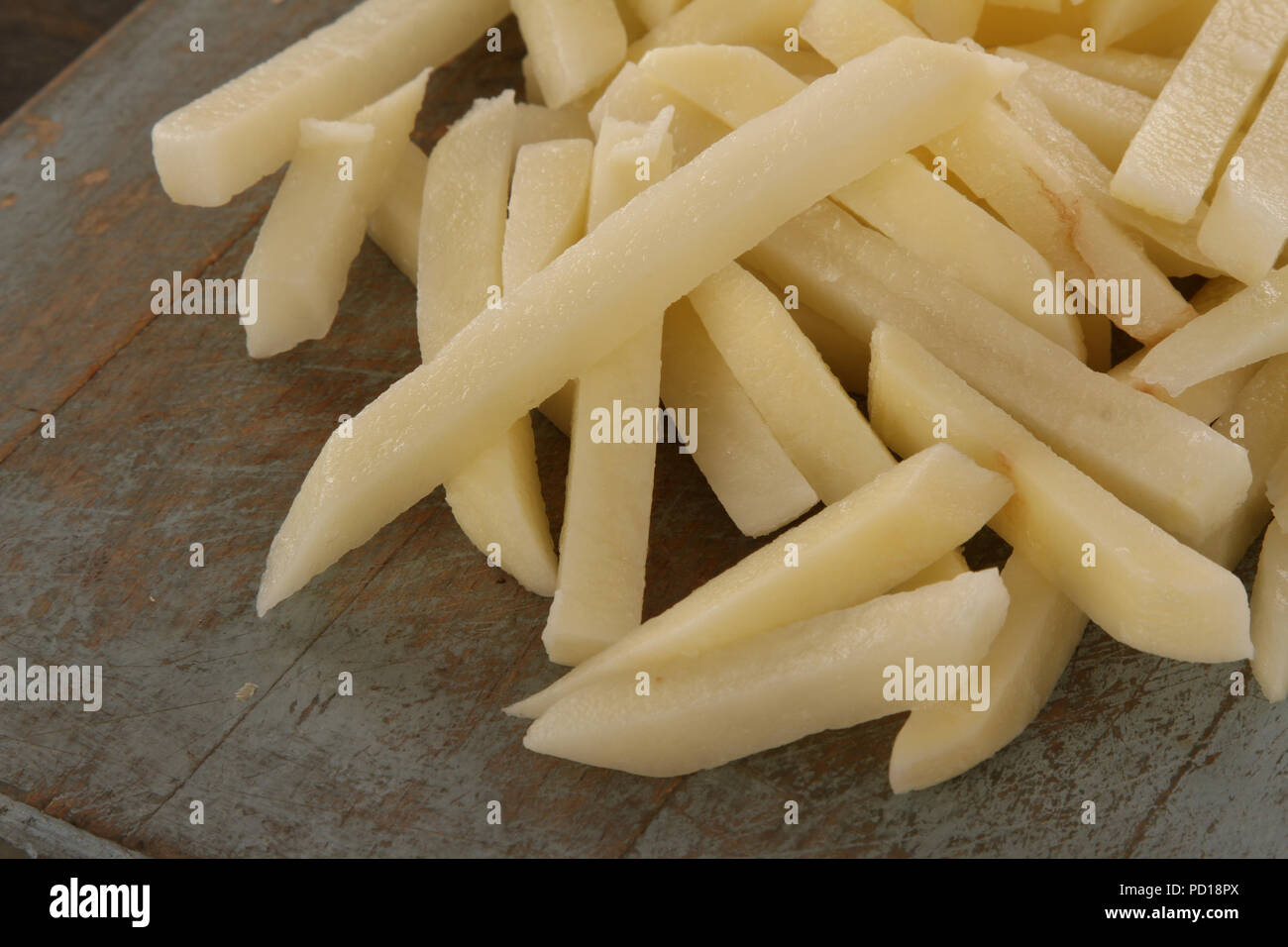 uncooked chipped potatoes Stock Photo - Alamy