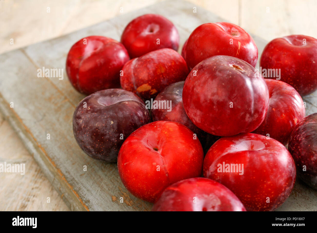 preparing fresh plums Stock Photo - Alamy
