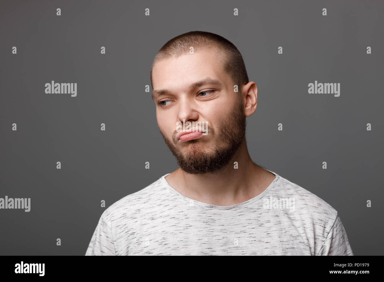 the portrait of the young bearded man Stock Photo - Alamy