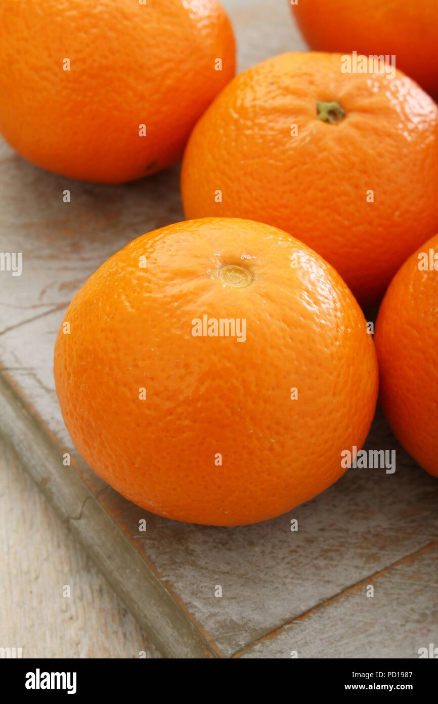 preparing fresh oranges Stock Photo - Alamy