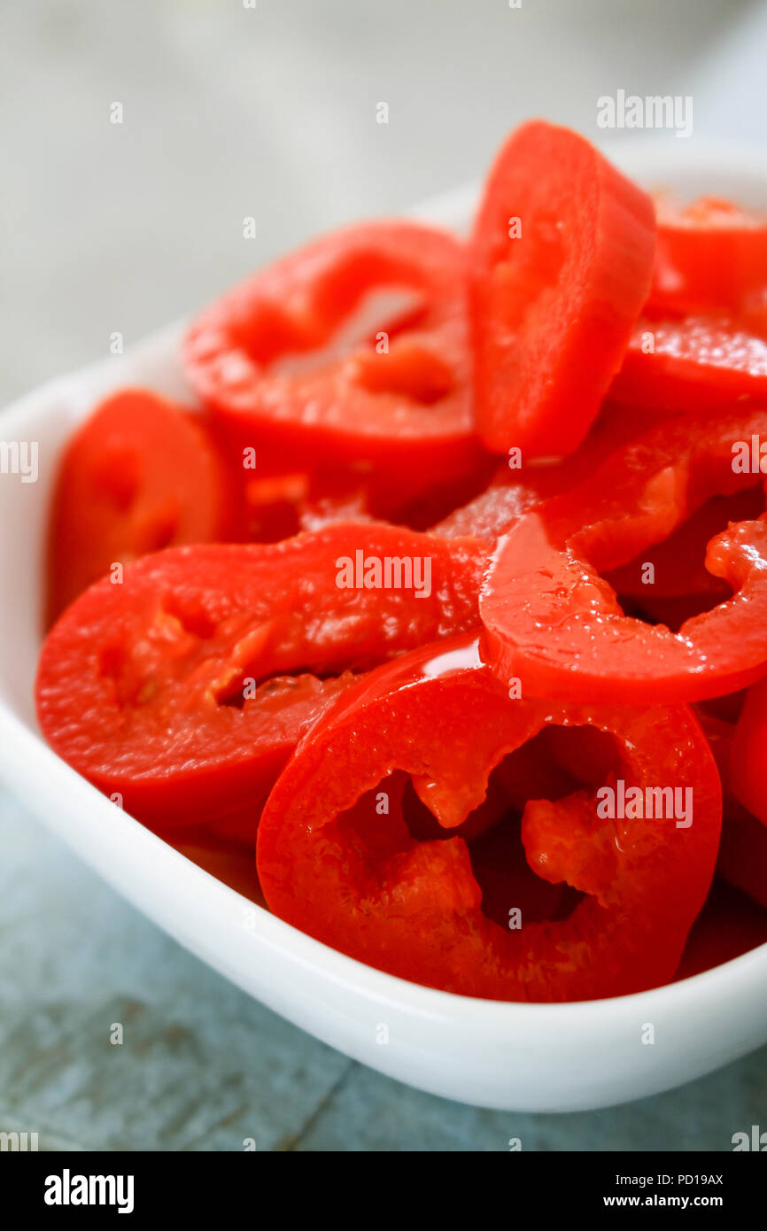 prepared sliced red chillies Stock Photo - Alamy