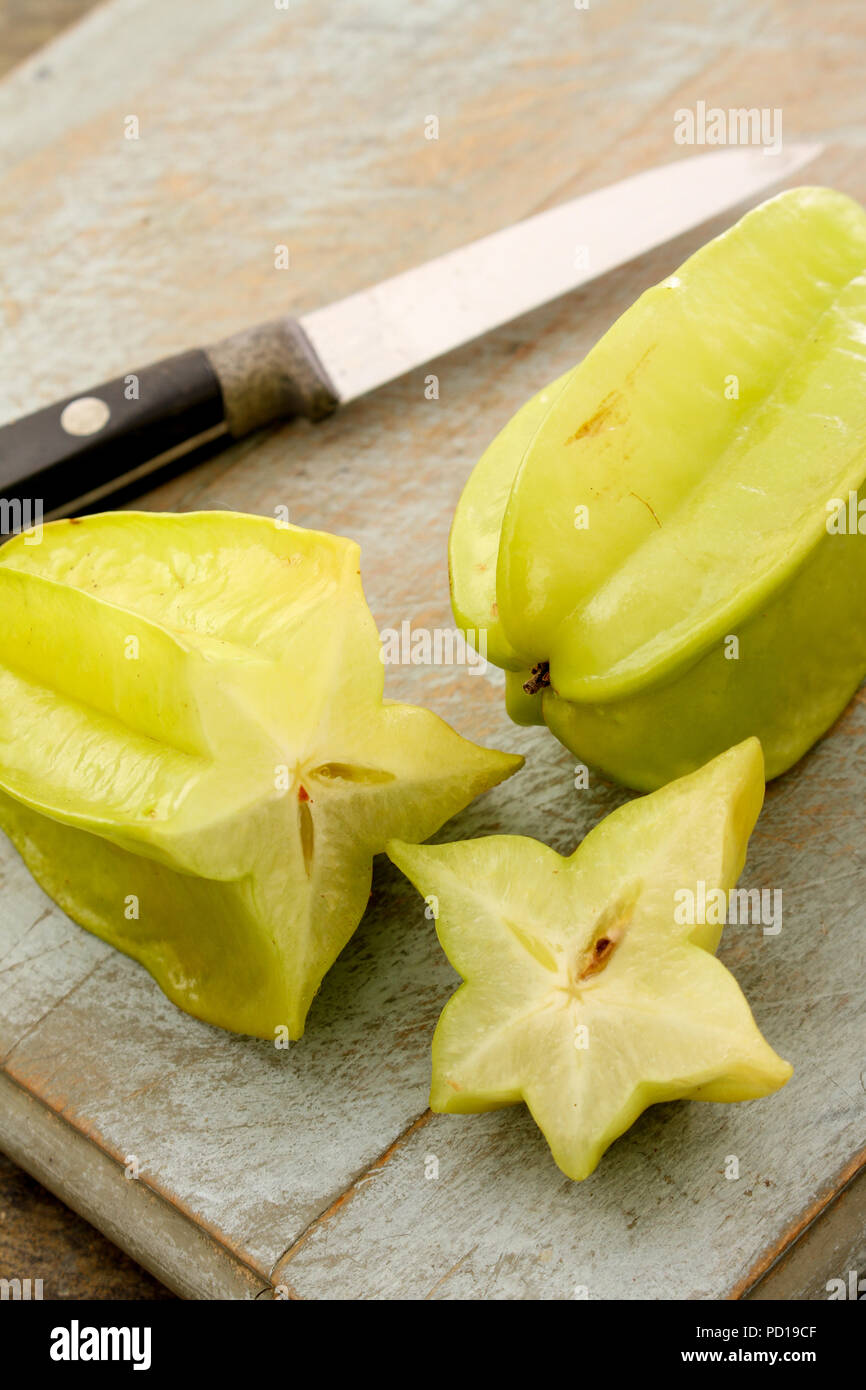 preparing fresh starfruit Stock Photo - Alamy