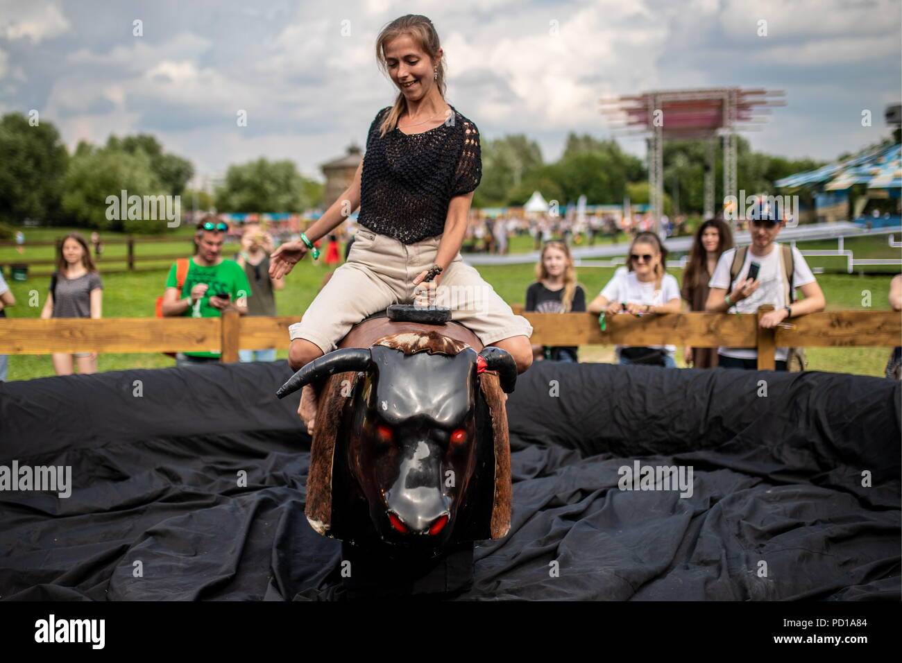 Girl Riding Mechanical Bull High Resolution Stock Photography and ...