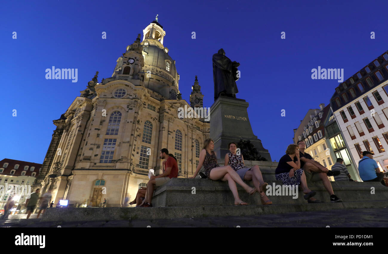 Dresden, Germany. 01st Aug, 2018. People sit at the Martin Luther ...