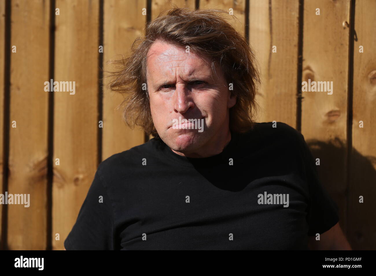 Siddington, Cheshire, UK. 5th August, 2018. Milton Jones backstage at ...