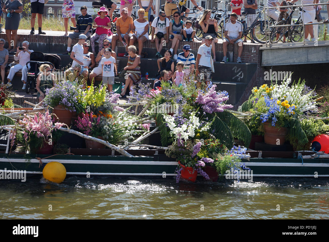 Boat decorated flowers netherlands amsterdam hi-res stock photography ...