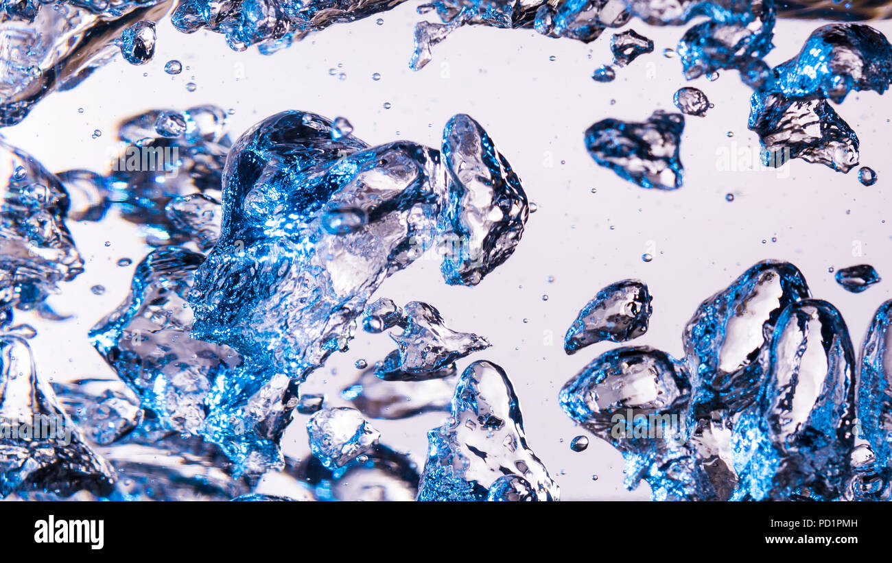 Abstract photo of water boiling close up Stock Photo - Alamy