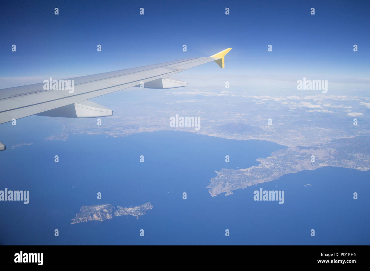 Aerial View of Italian Coastline with Wing of Plane in Flight Stock ...